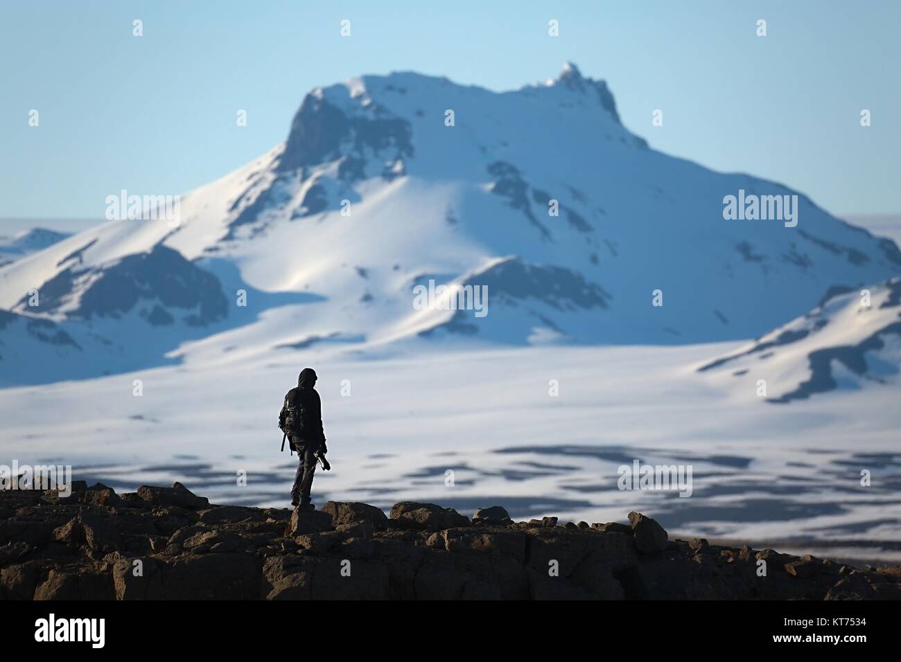 Standing on a cliff Stock Photo - Alamy