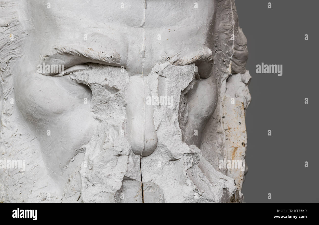 Positive Negative Form. Hands of sculptor and hammer detail while ...