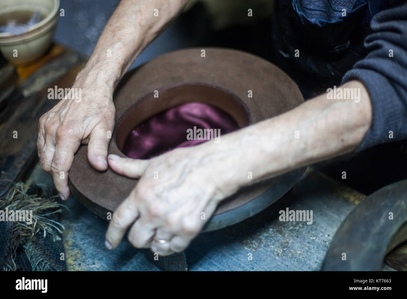 Hatter making a hat Stock Photo - Alamy