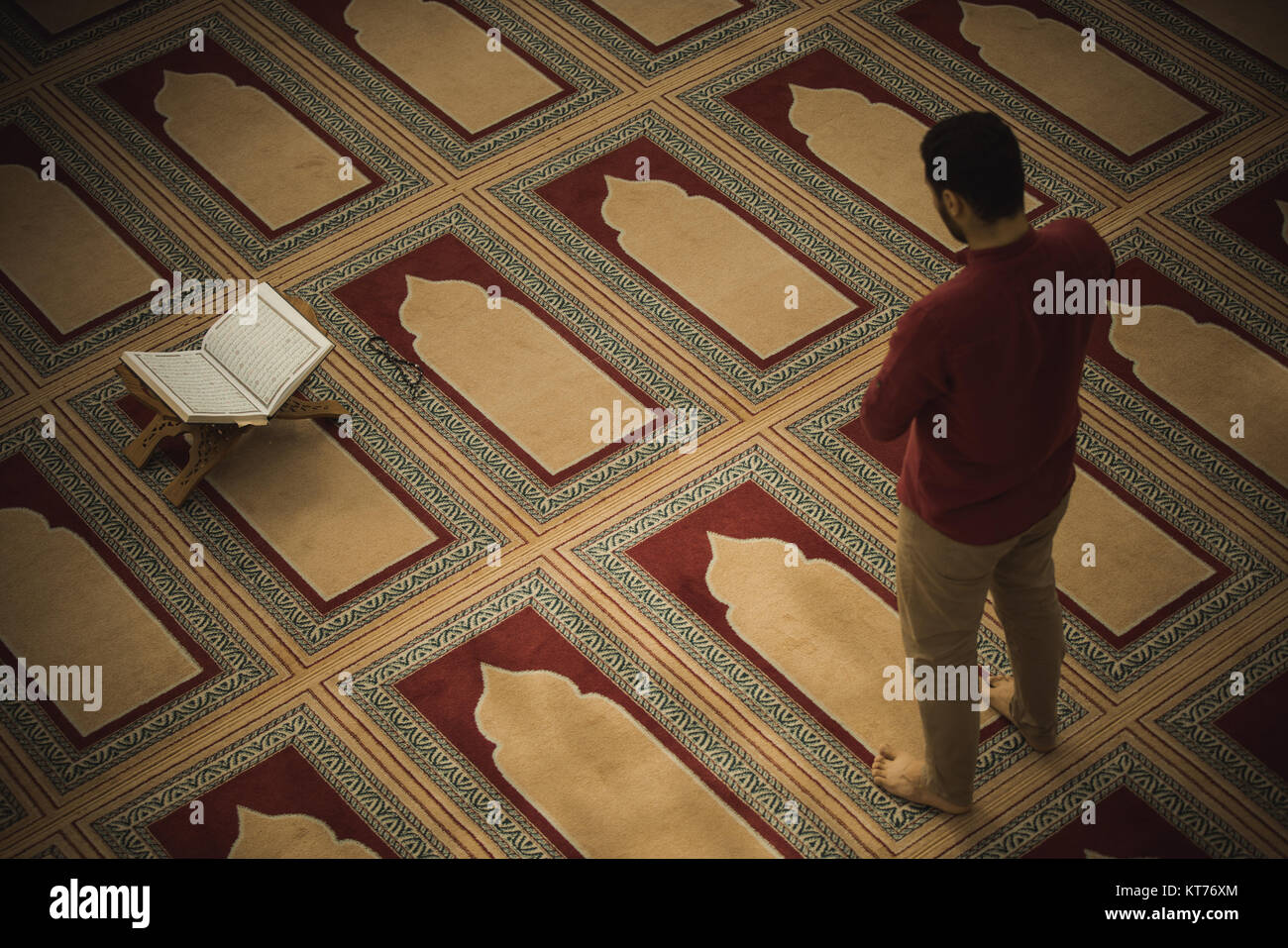 Religious muslim man praying inside the mosque Stock Photo - Alamy