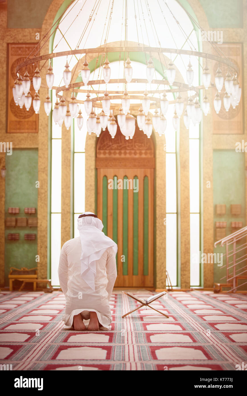 Religious muslim man praying inside the mosque Stock Photo - Alamy
