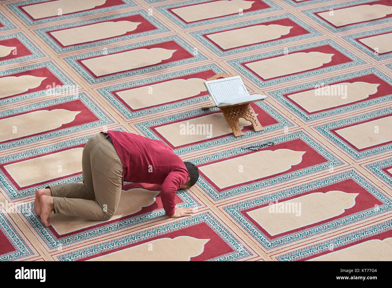 Religious muslim man praying inside the mosque Stock Photo - Alamy