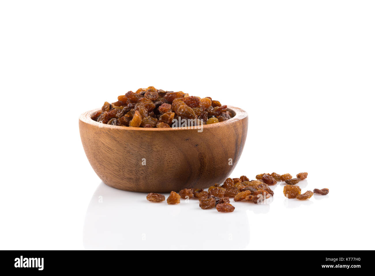 Sweet raisins on white Stock Photo - Alamy
