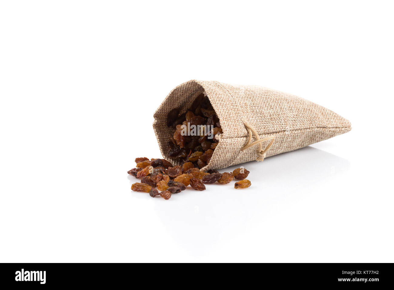 Sweet raisins on white Stock Photo - Alamy