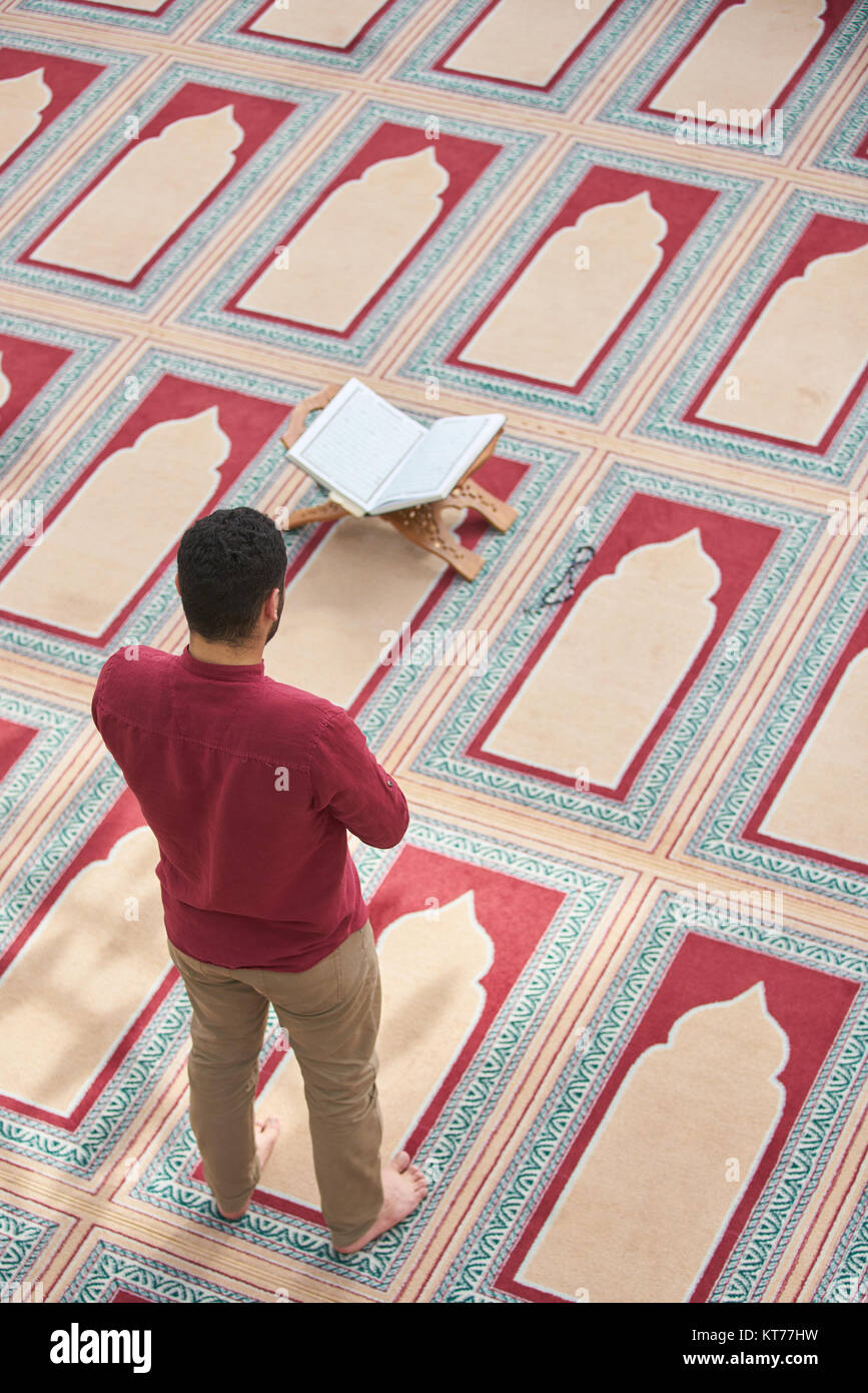 Religious muslim man praying inside the mosque Stock Photo - Alamy