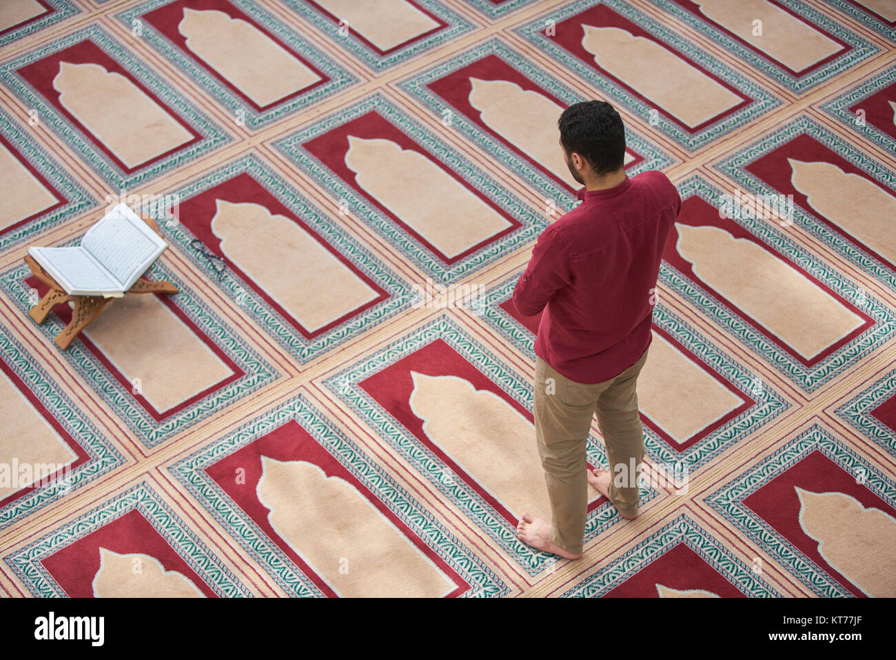 Religious muslim man praying inside the mosque Stock Photo - Alamy