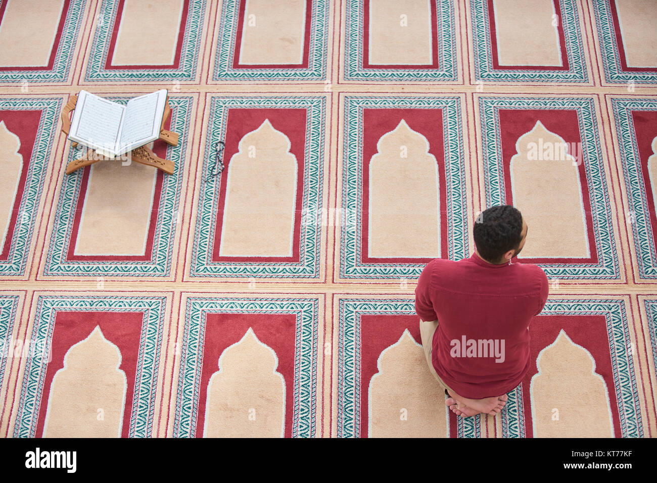 Religious muslim man praying inside the mosque Stock Photo - Alamy