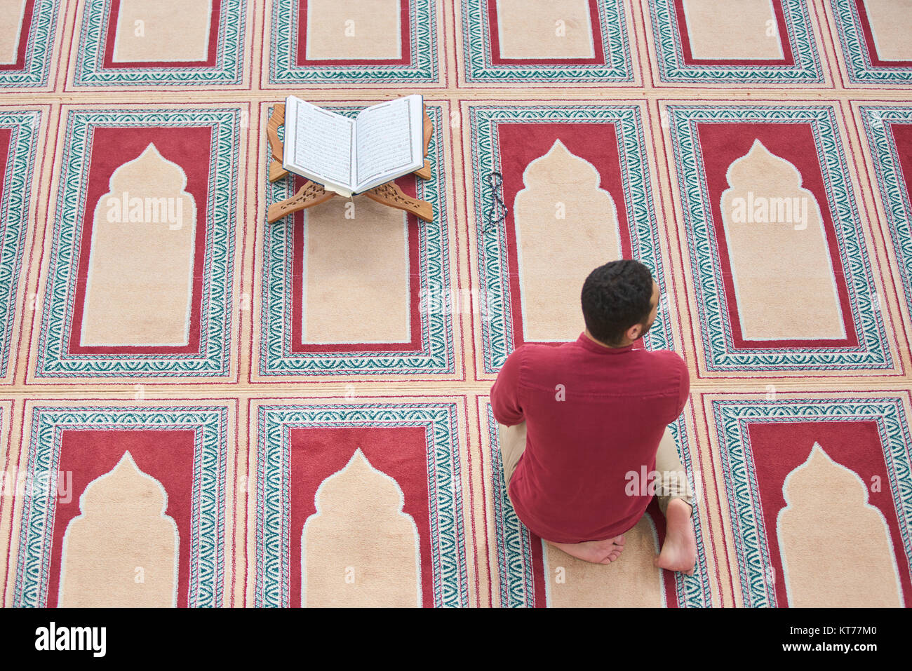 Religious muslim man praying inside the mosque Stock Photo - Alamy