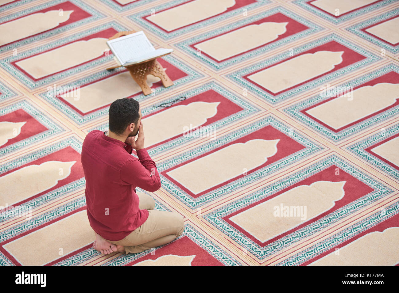 Religious muslim man praying inside the mosque Stock Photo - Alamy