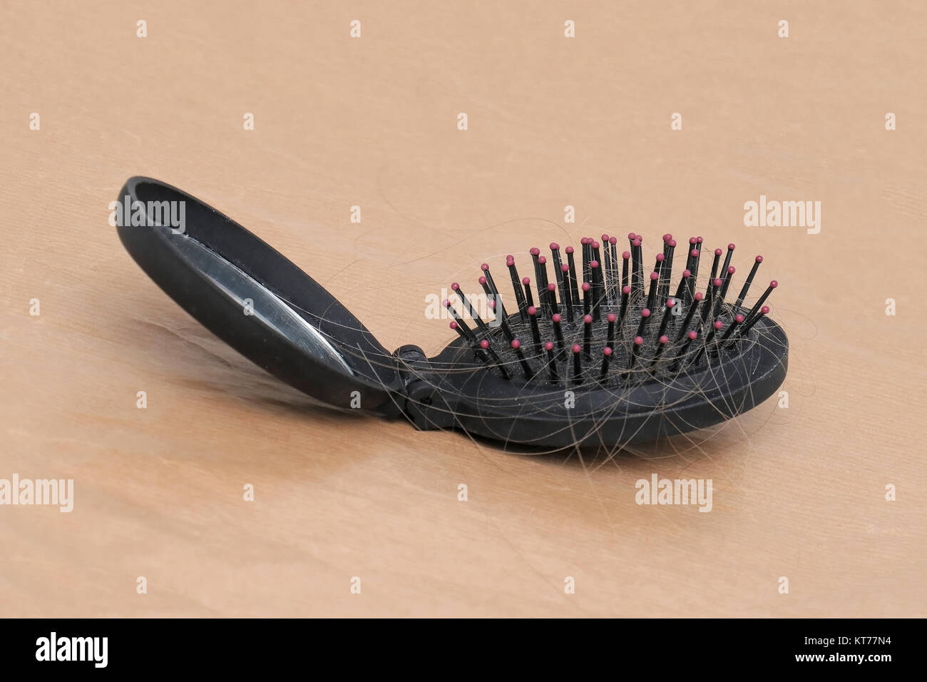 Fallen hair on brush Stock Photo - Alamy