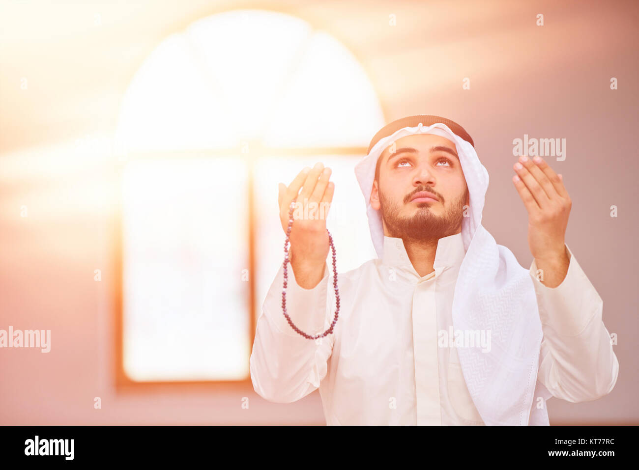 Religious muslim man praying inside the mosque Stock Photo - Alamy