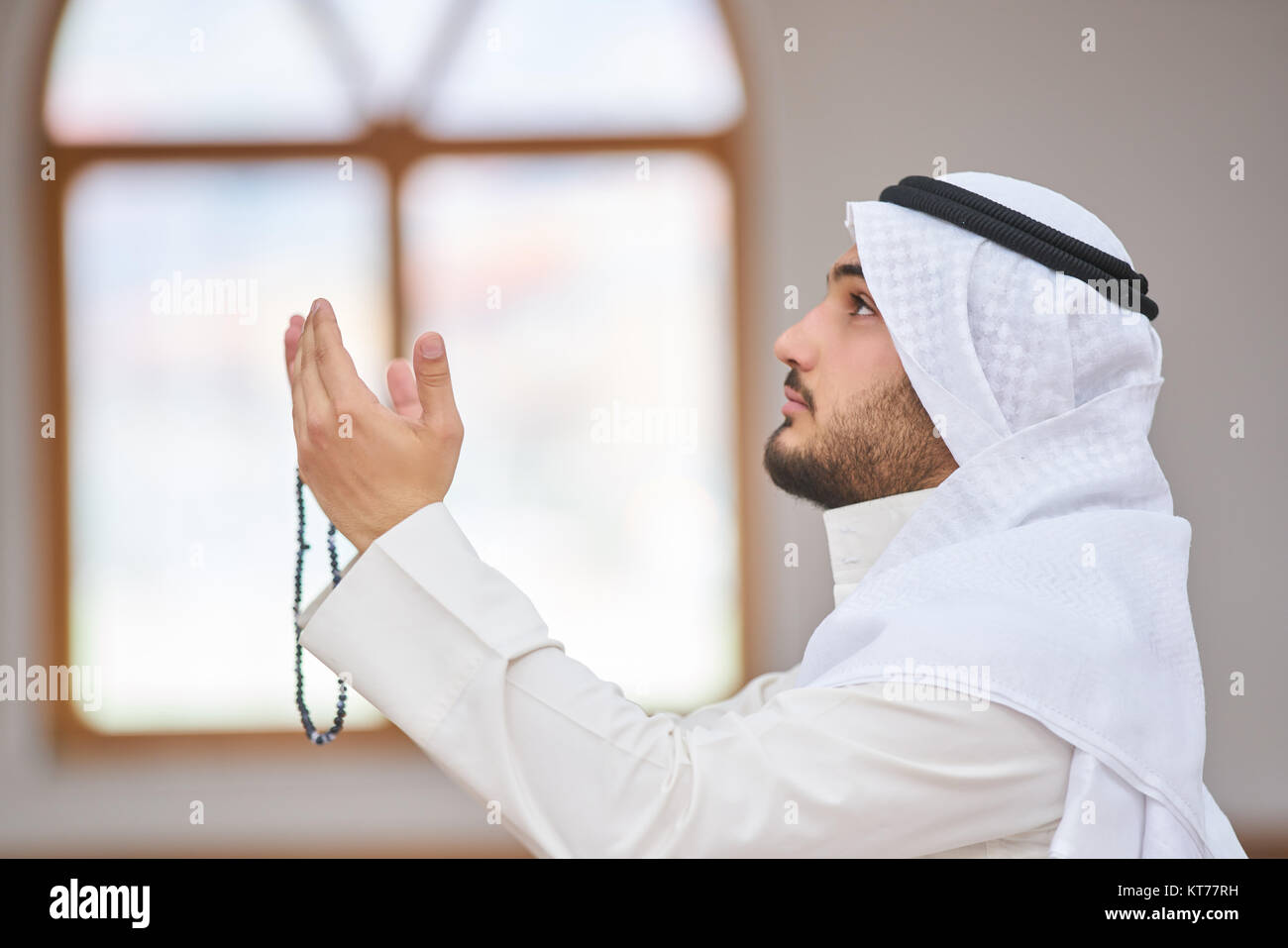 Religious muslim man praying inside the mosque Stock Photo - Alamy