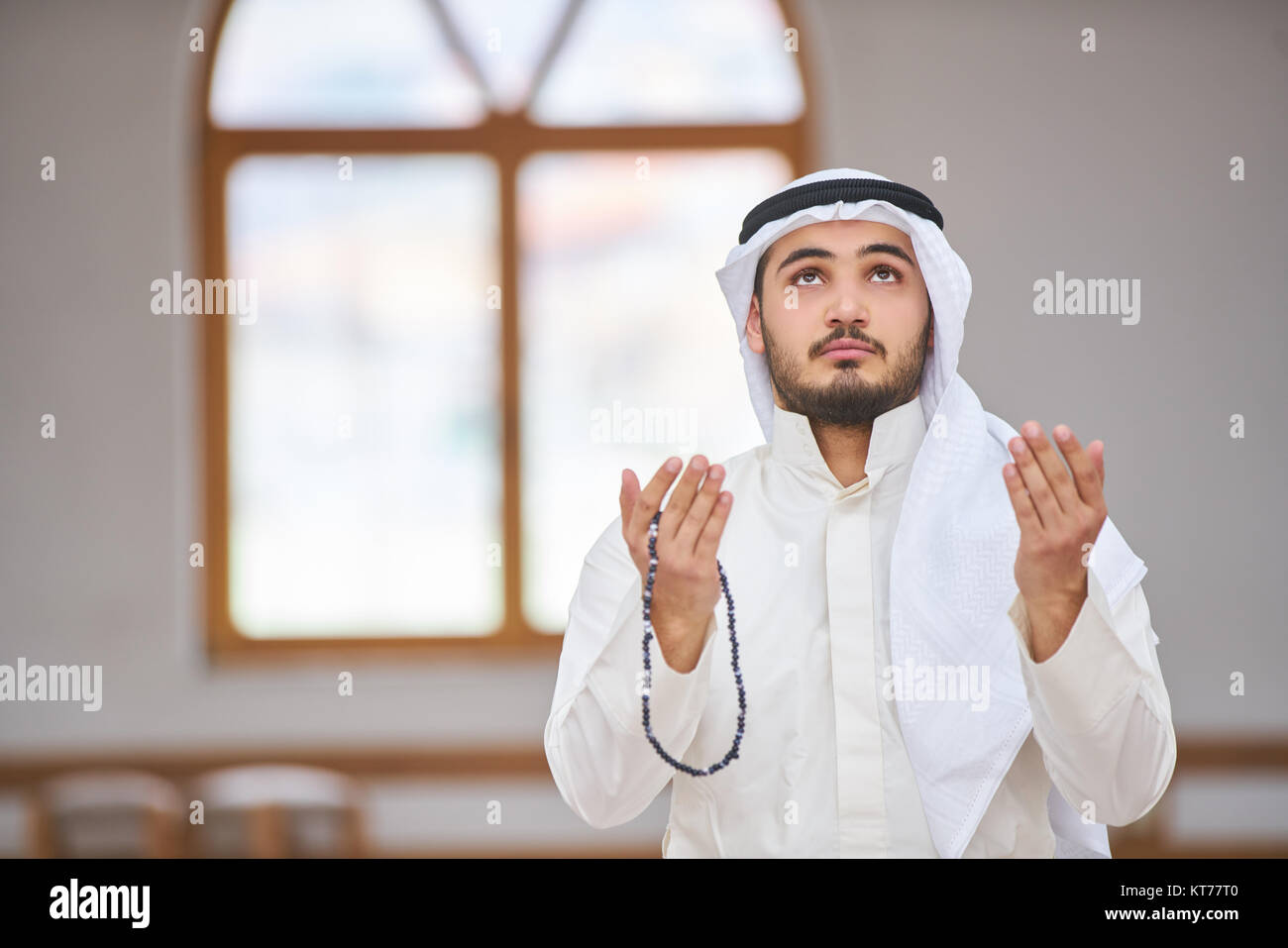 Religious muslim man praying inside the mosque Stock Photo - Alamy