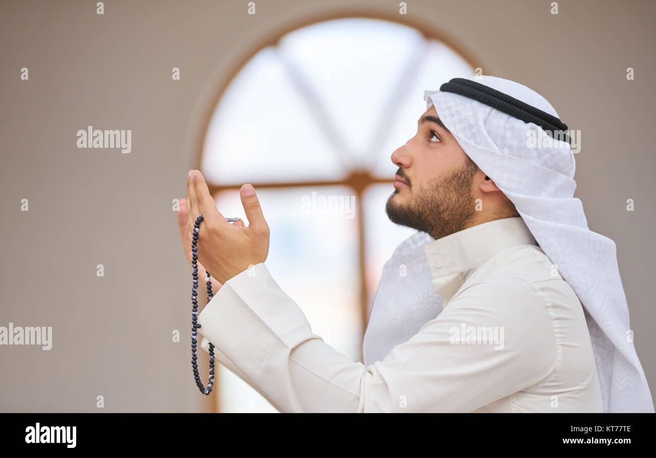 Religious muslim man praying inside the mosque Stock Photo - Alamy