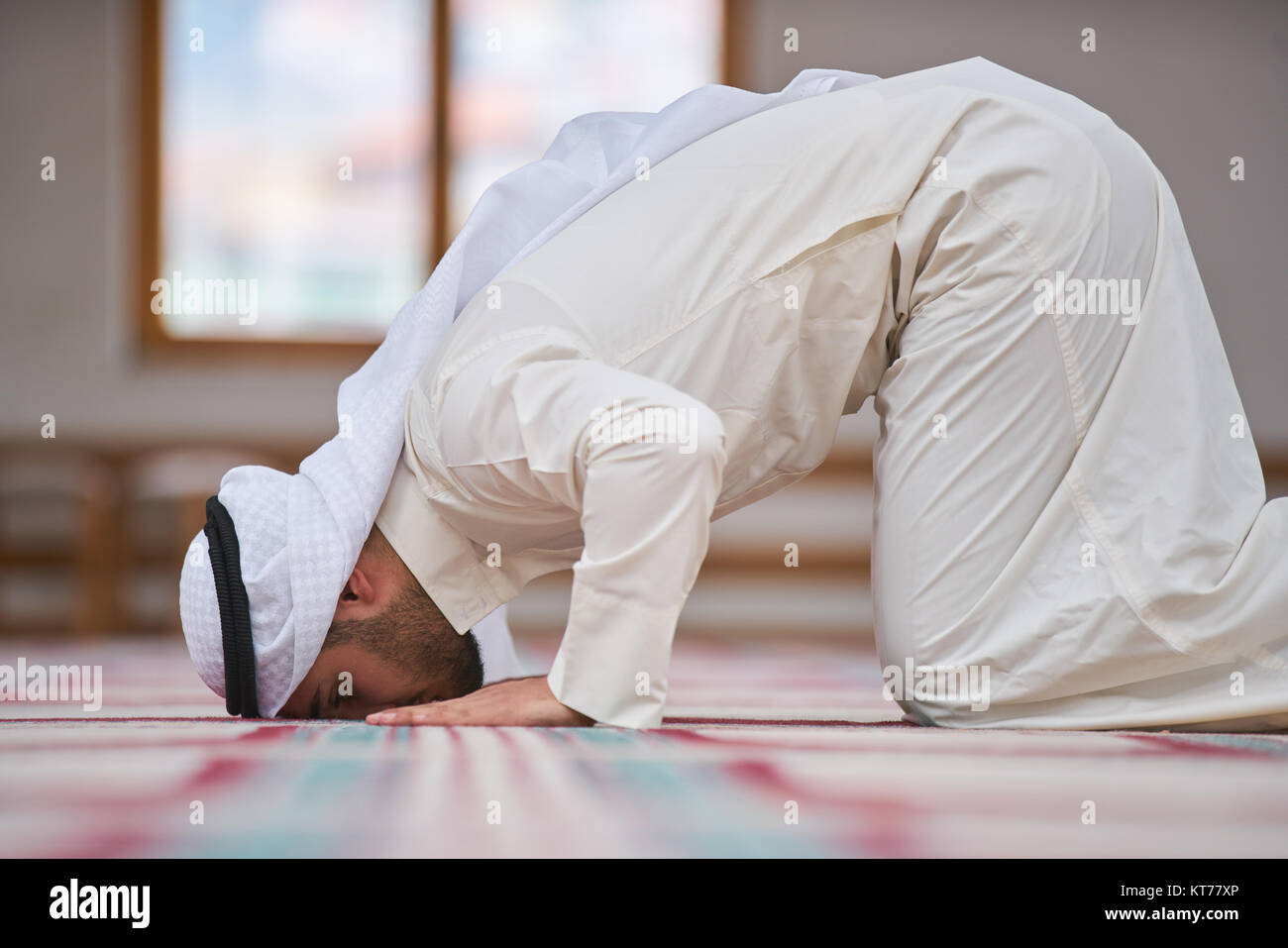Religious muslim man praying inside the mosque Stock Photo - Alamy