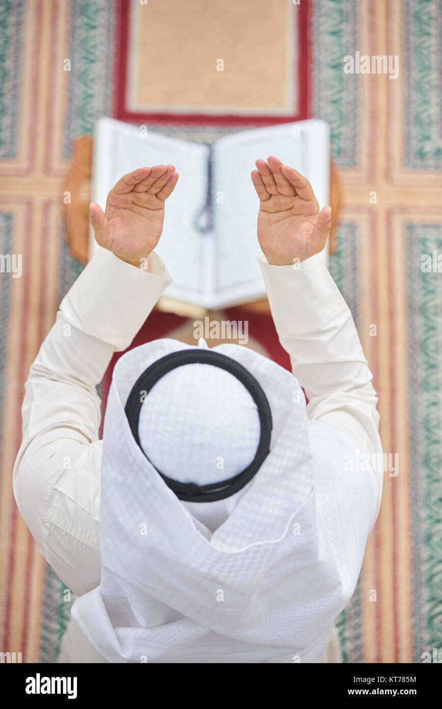 Religious muslim man praying inside the mosque Stock Photo - Alamy