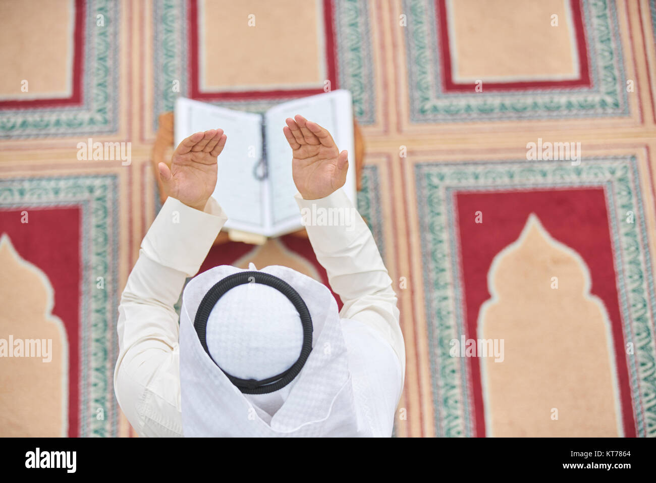 Religious muslim man praying inside the mosque Stock Photo - Alamy