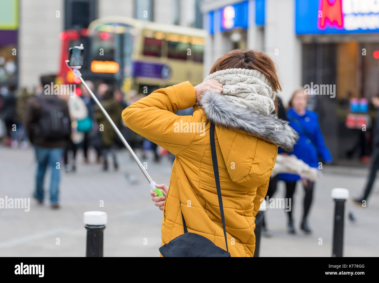 Using a stick hi-res stock photography and images - Alamy