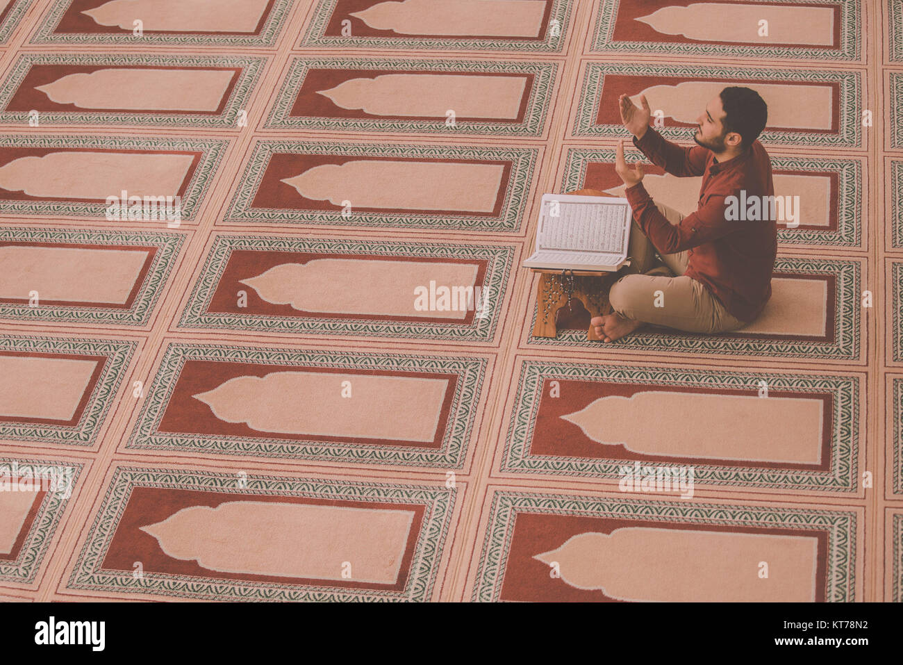 Religious muslim man praying inside the mosque Stock Photo - Alamy