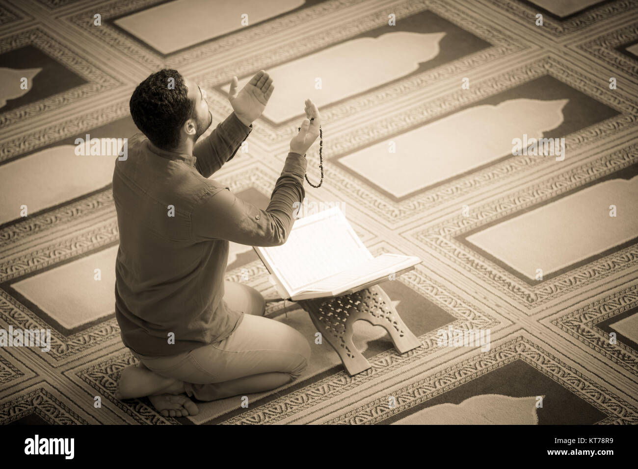 Religious muslim man praying inside the mosque Stock Photo - Alamy