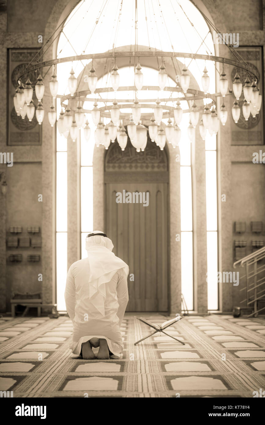 Religious muslim man praying inside the mosque Stock Photo - Alamy
