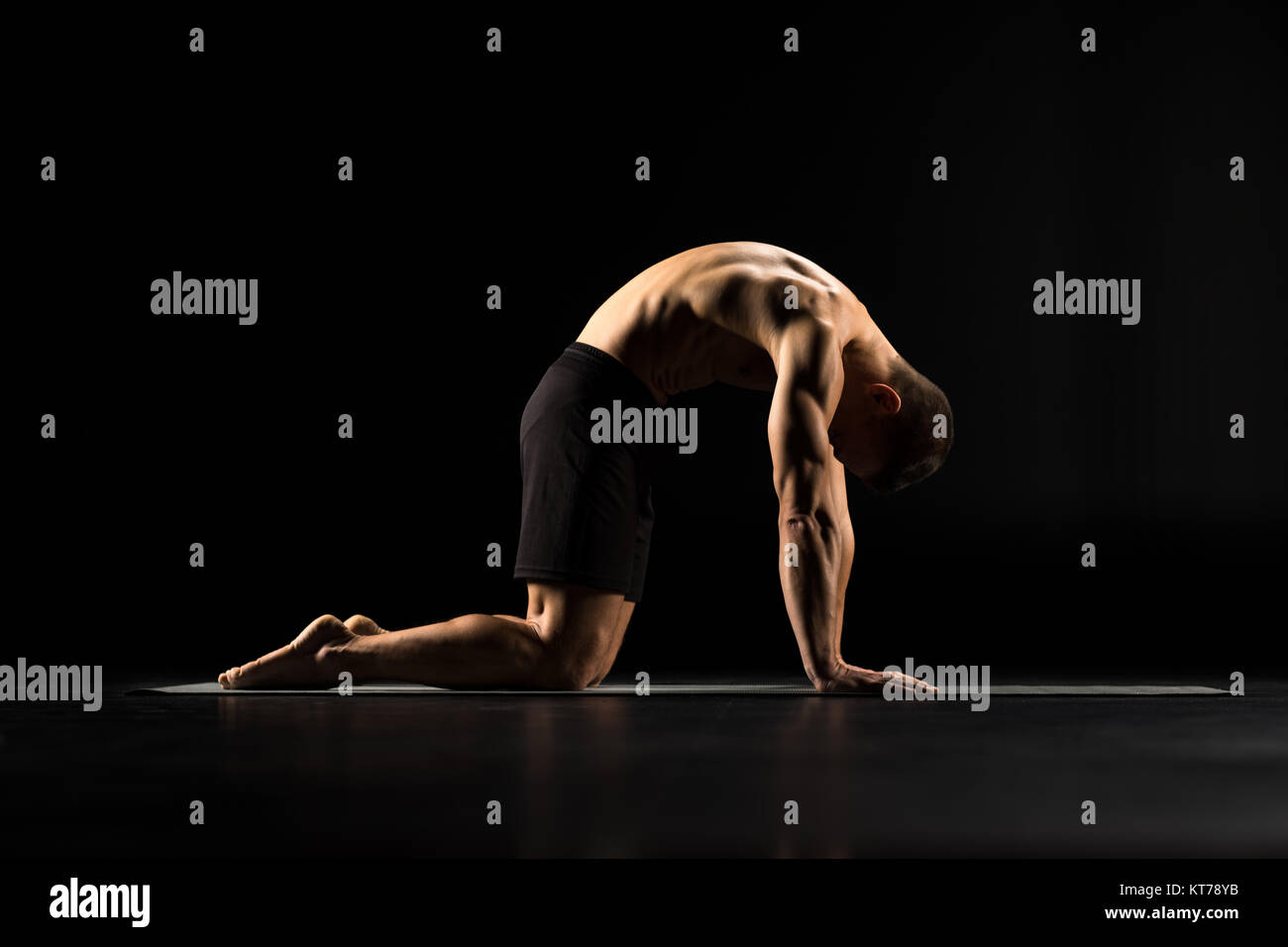 Man standing in yoga position Stock Photo - Alamy
