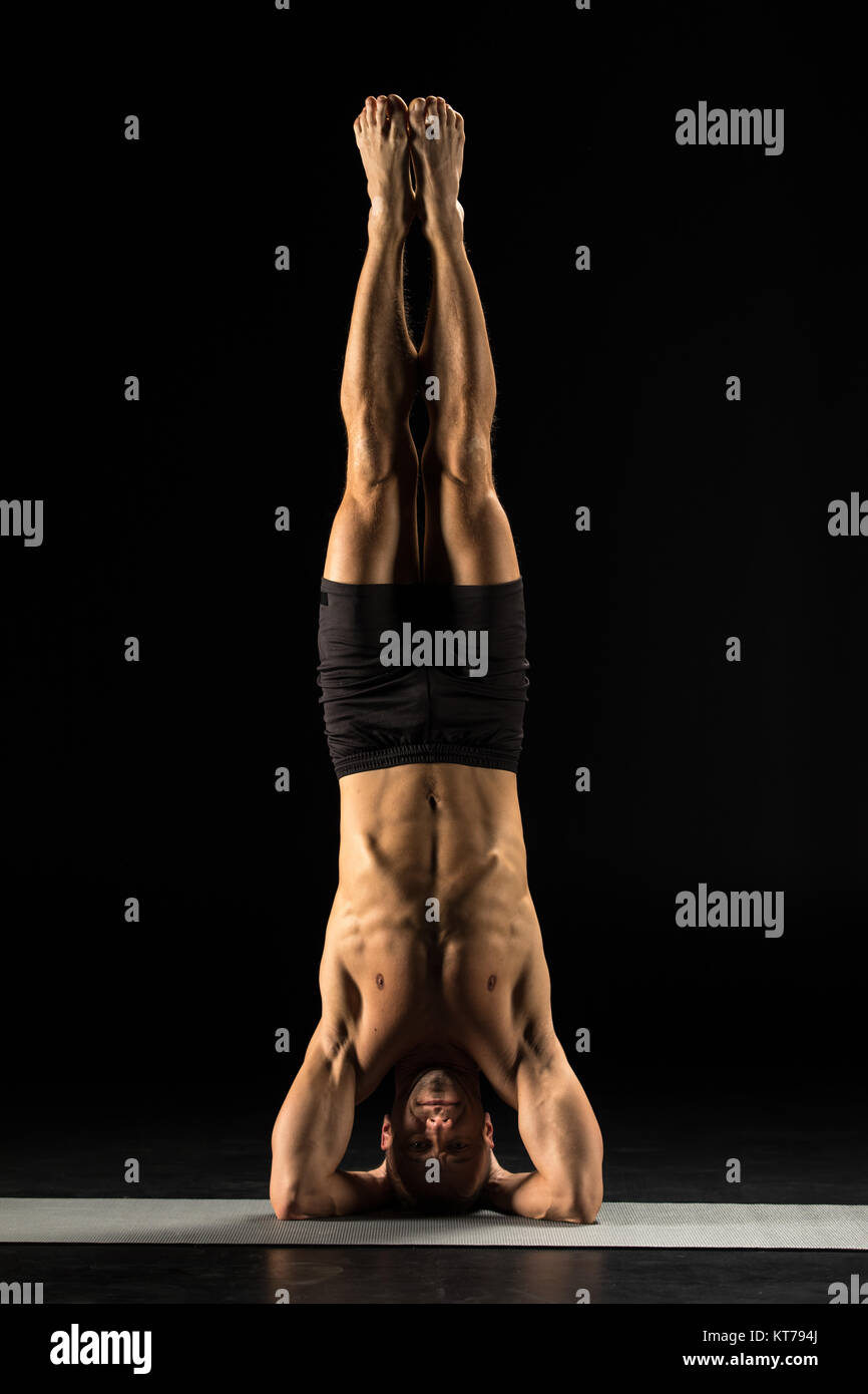 Man standing in yoga position Stock Photo - Alamy