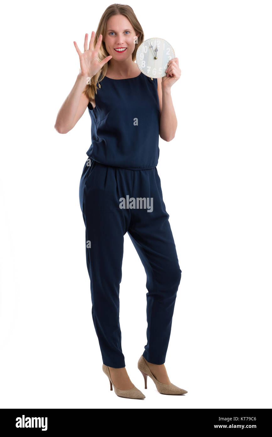 Smiling blonde woman in blue trousers suit playing with a clock and ...