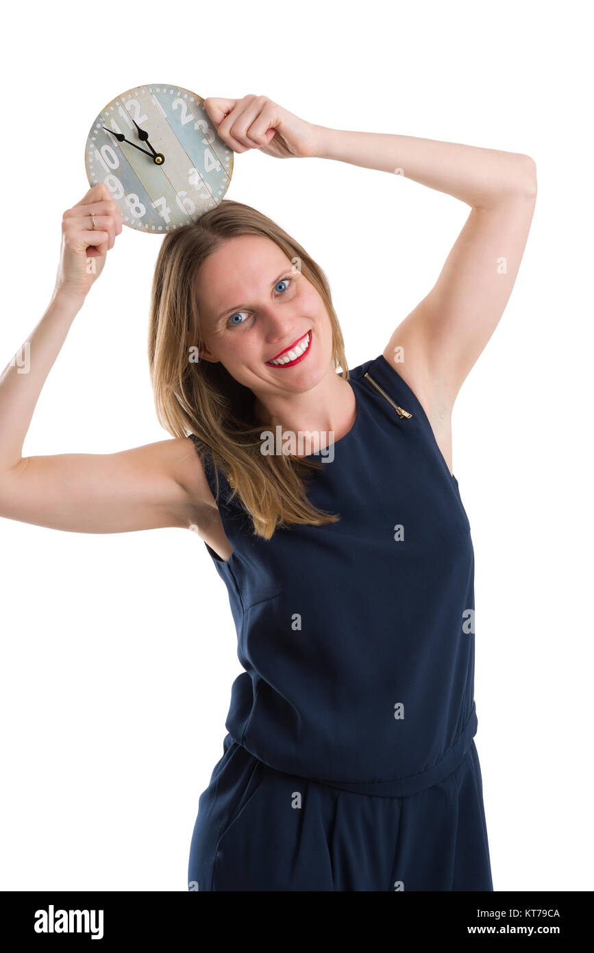 Smiling blonde woman in blue trousers suit playing with a clock and ...