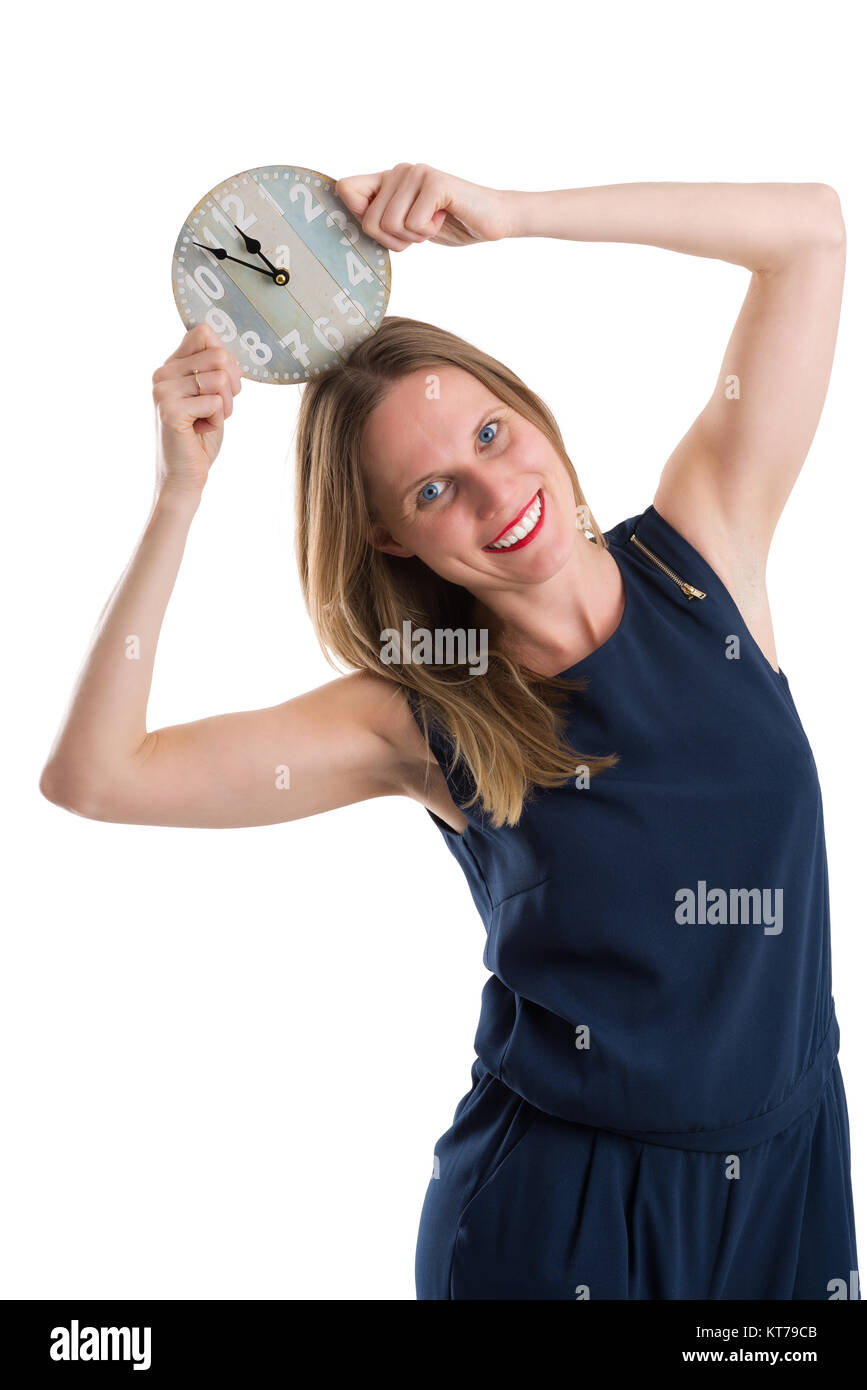 Smiling blonde woman in blue trousers suit playing with a clock and ...