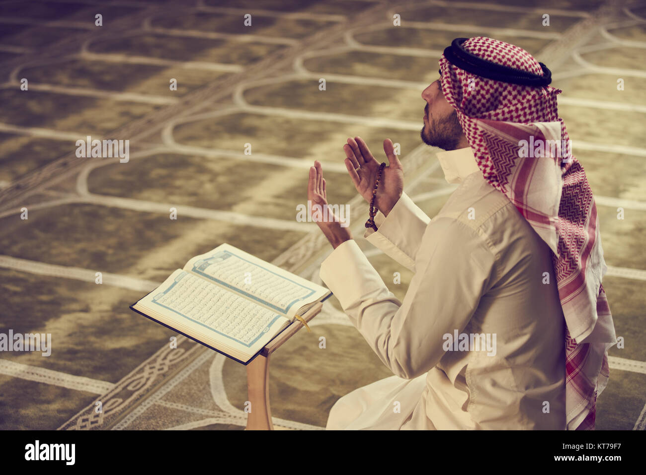 Religious muslim man praying inside the mosque Stock Photo - Alamy