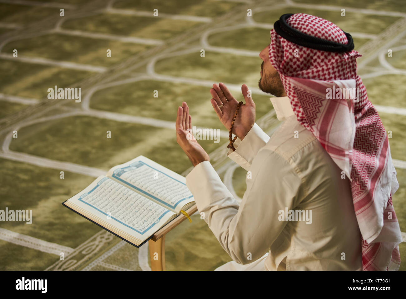 Religious muslim man praying inside the mosque Stock Photo - Alamy