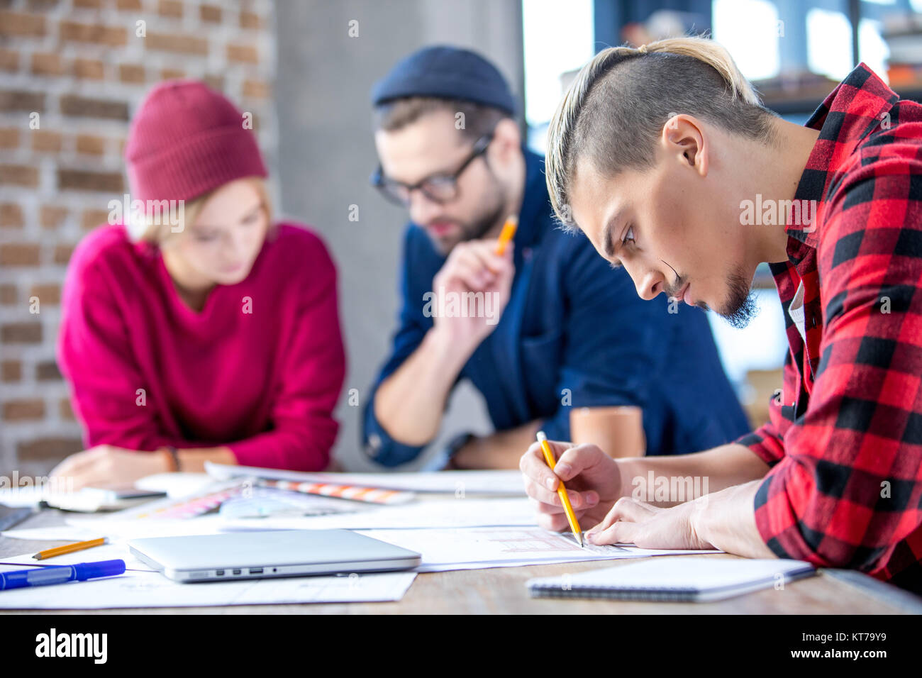 Male architect with blueprints Stock Photo - Alamy