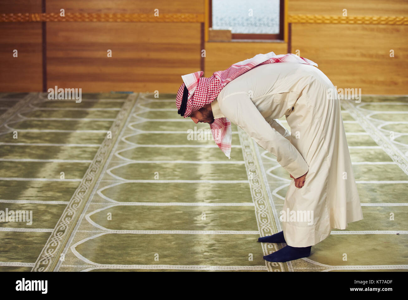 Religious muslim man praying inside the mosque Stock Photo - Alamy