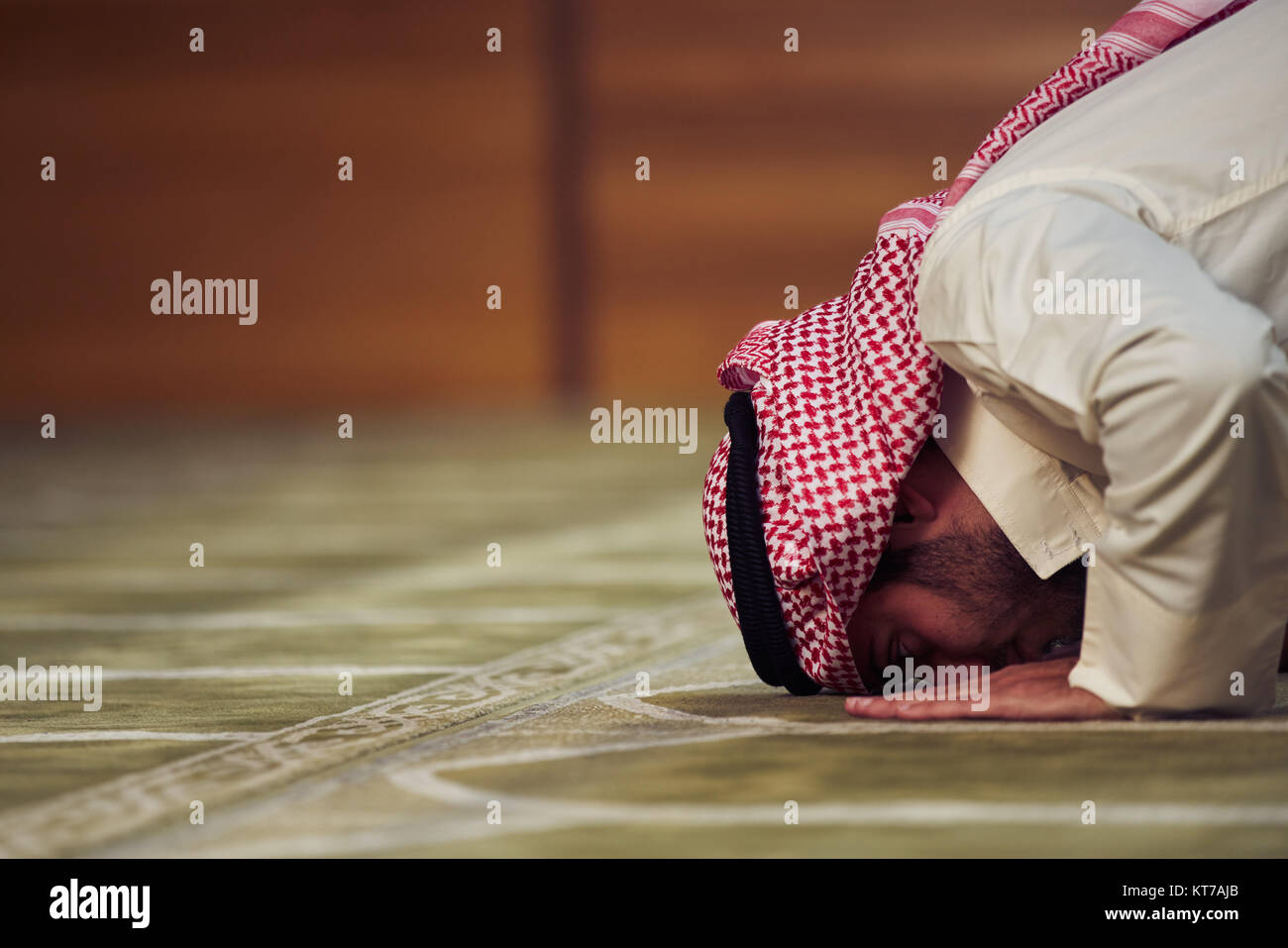 Religious muslim man praying inside the mosque Stock Photo - Alamy