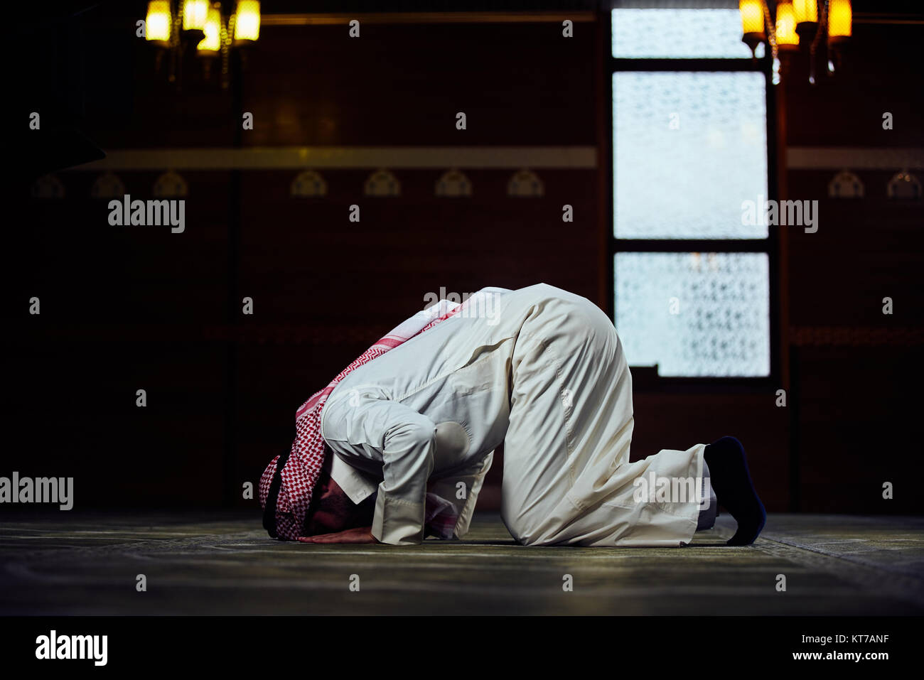 Religious muslim man praying inside the mosque Stock Photo - Alamy
