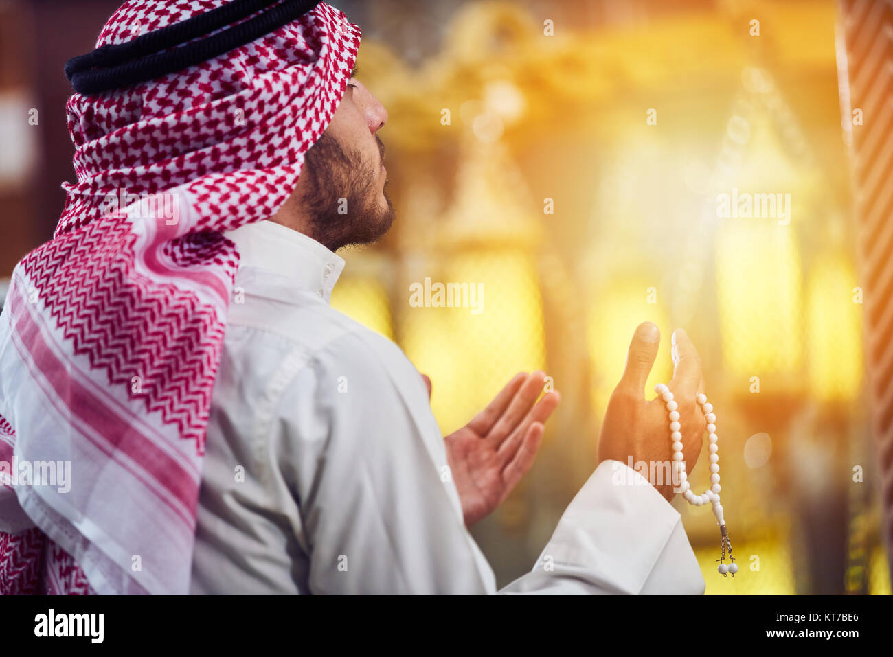 Religious muslim man praying inside the mosque Stock Photo - Alamy