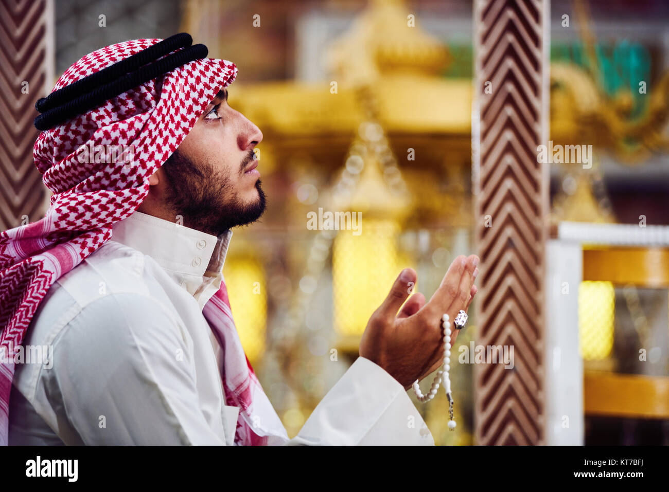 Religious muslim man praying inside the mosque Stock Photo - Alamy