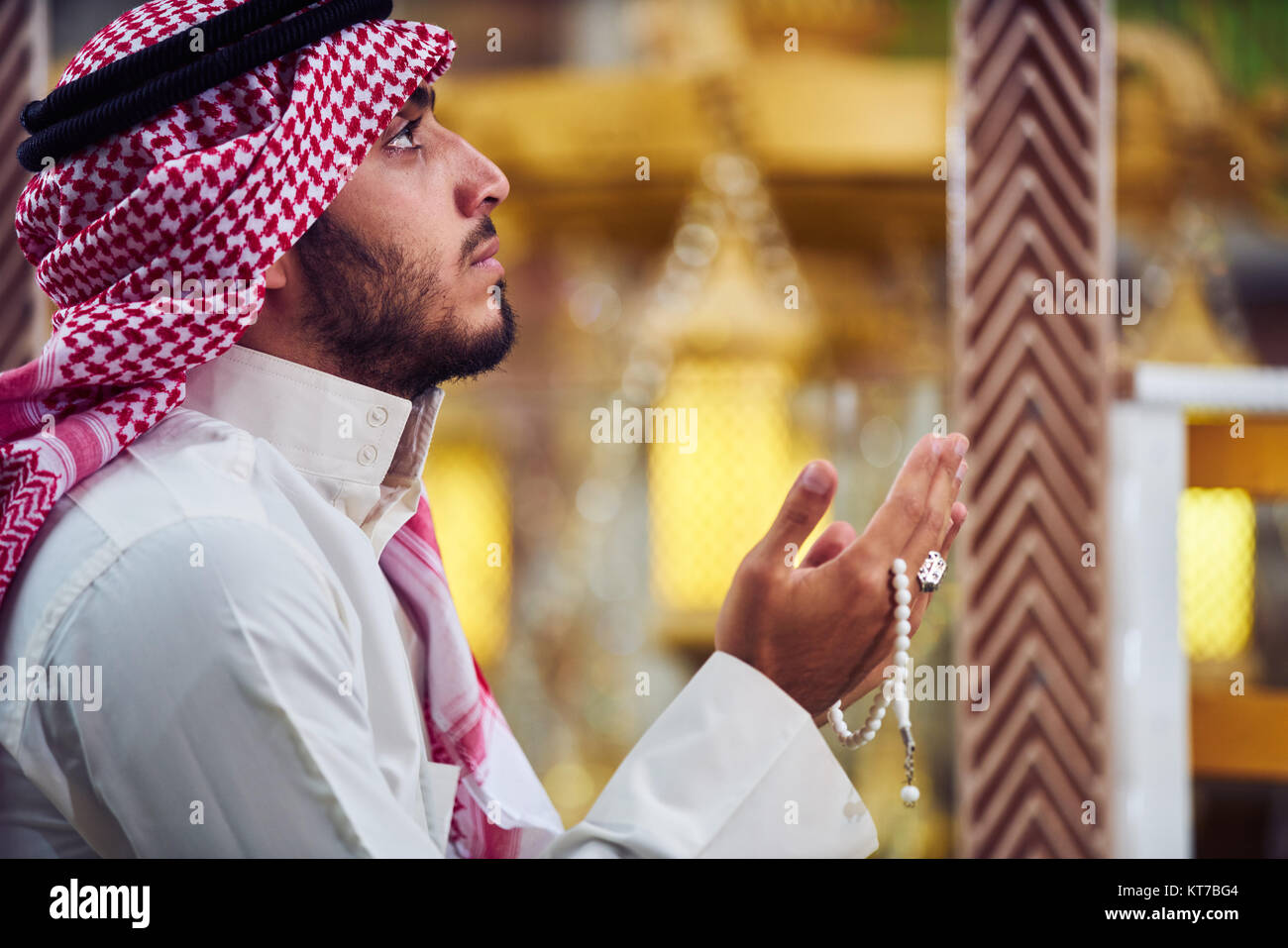 Religious muslim man praying inside the mosque Stock Photo - Alamy