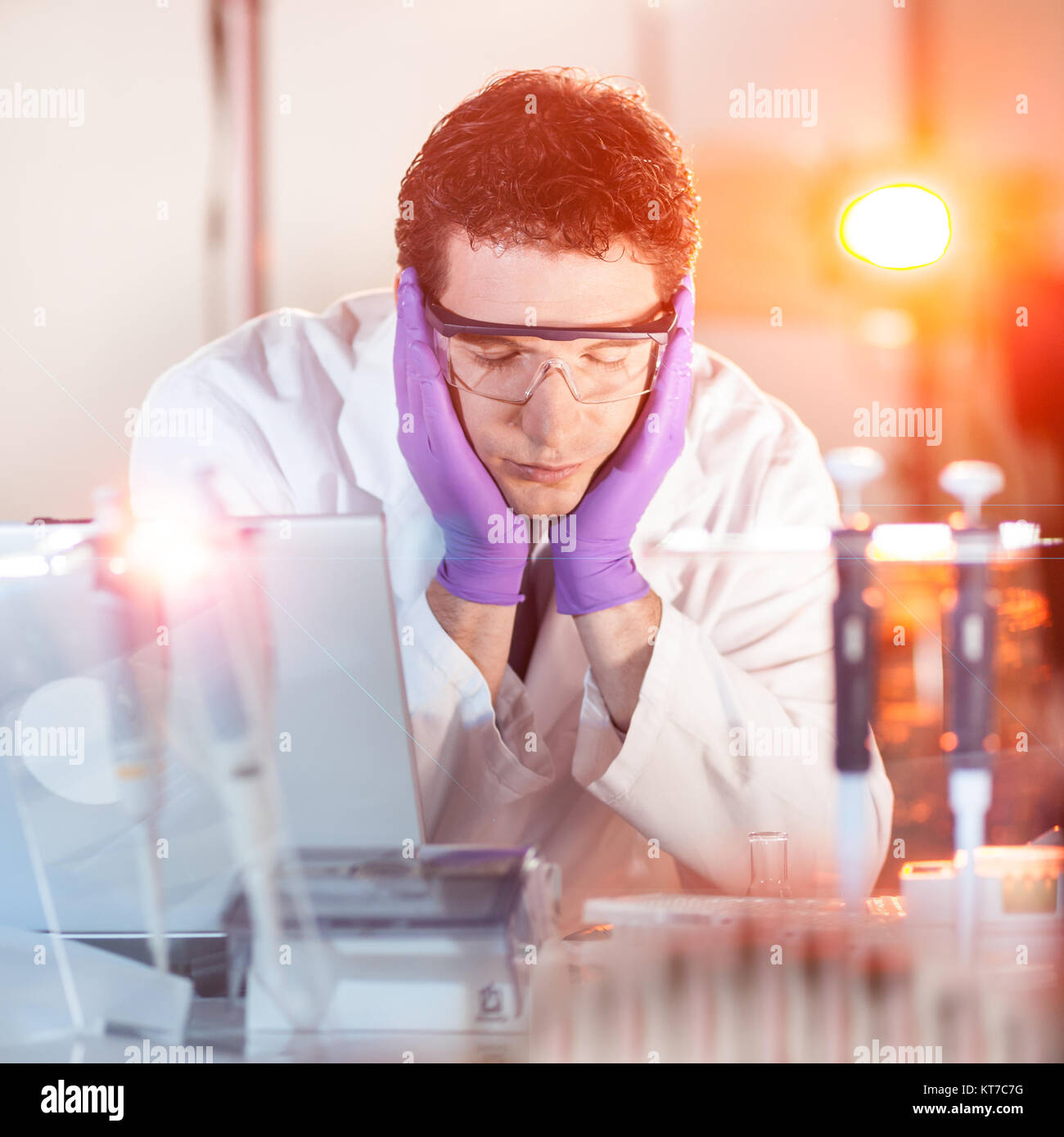 Researcher sleeping at workplace Stock Photo - Alamy