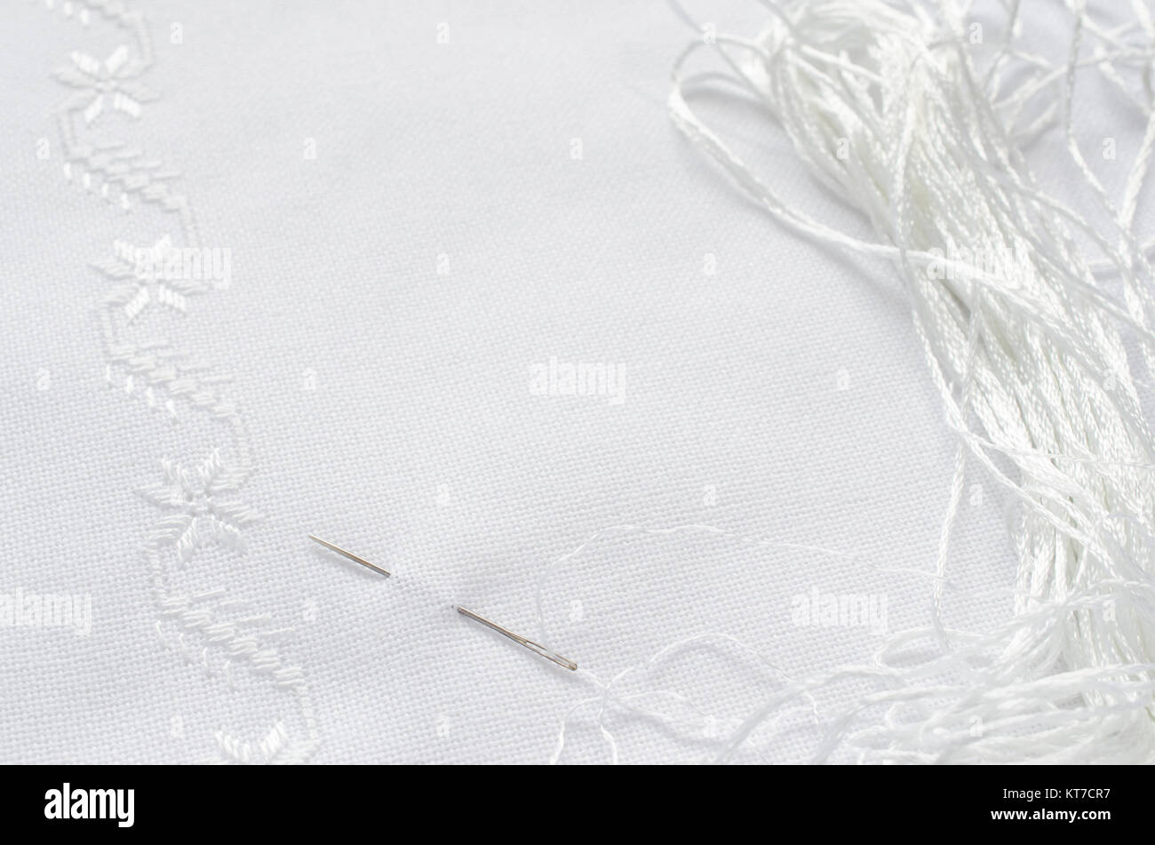 Texture of linen fabric with white silk embroidery Stock Photo - Alamy