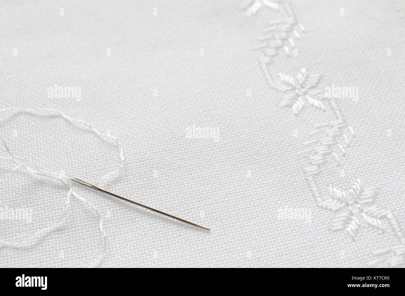 Texture of linen fabric with white silk embroidery Stock Photo - Alamy