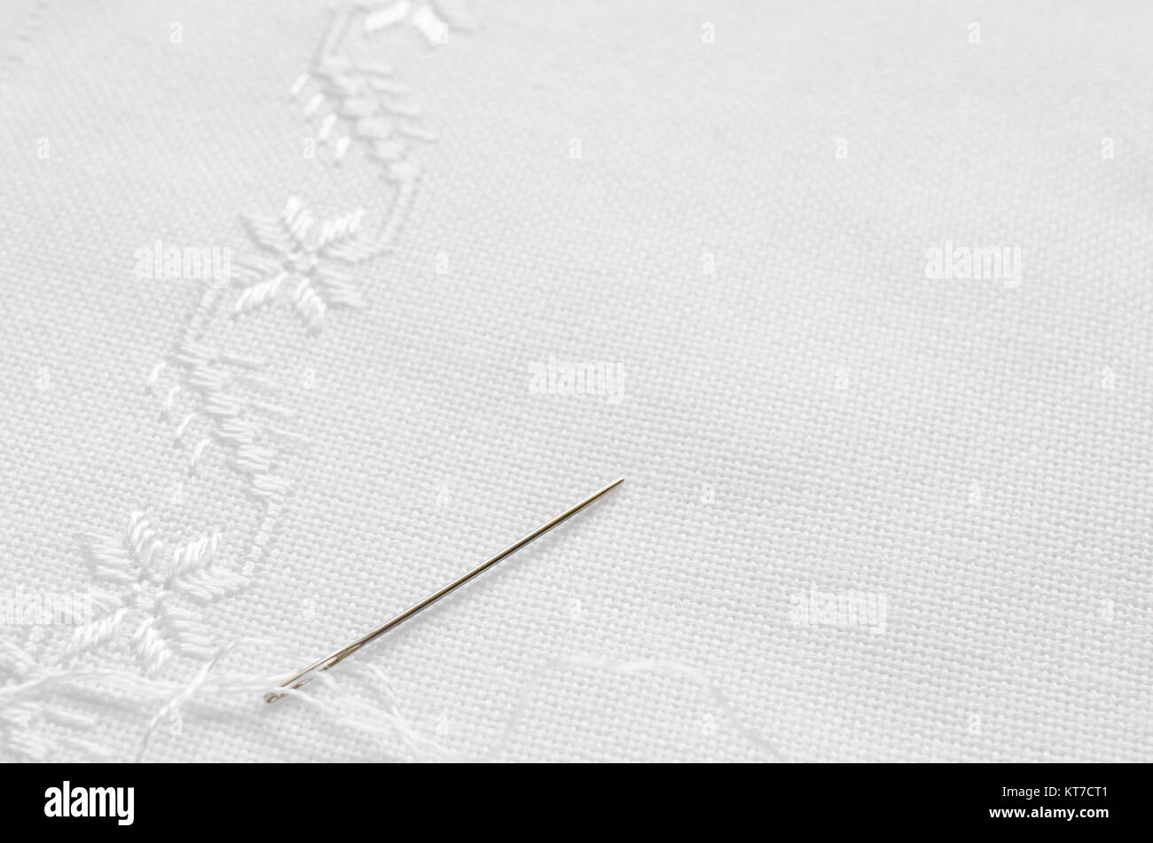 Texture of linen fabric with white silk embroidery Stock Photo - Alamy