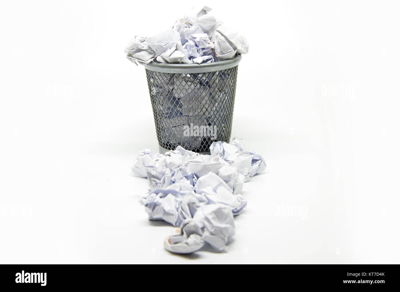 Garbage bin with paper waste Stock Photo - Alamy