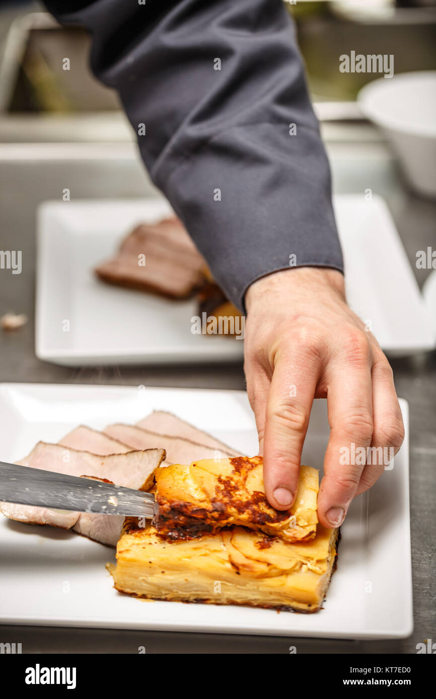 Chef making a lunch dish Stock Photo - Alamy