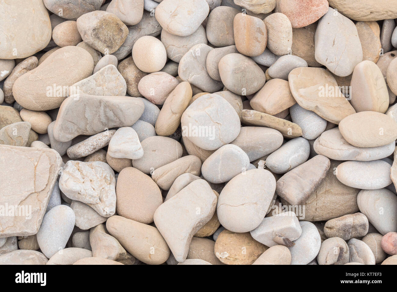 Rounded grey granite rocks beach hi-res stock photography and images ...