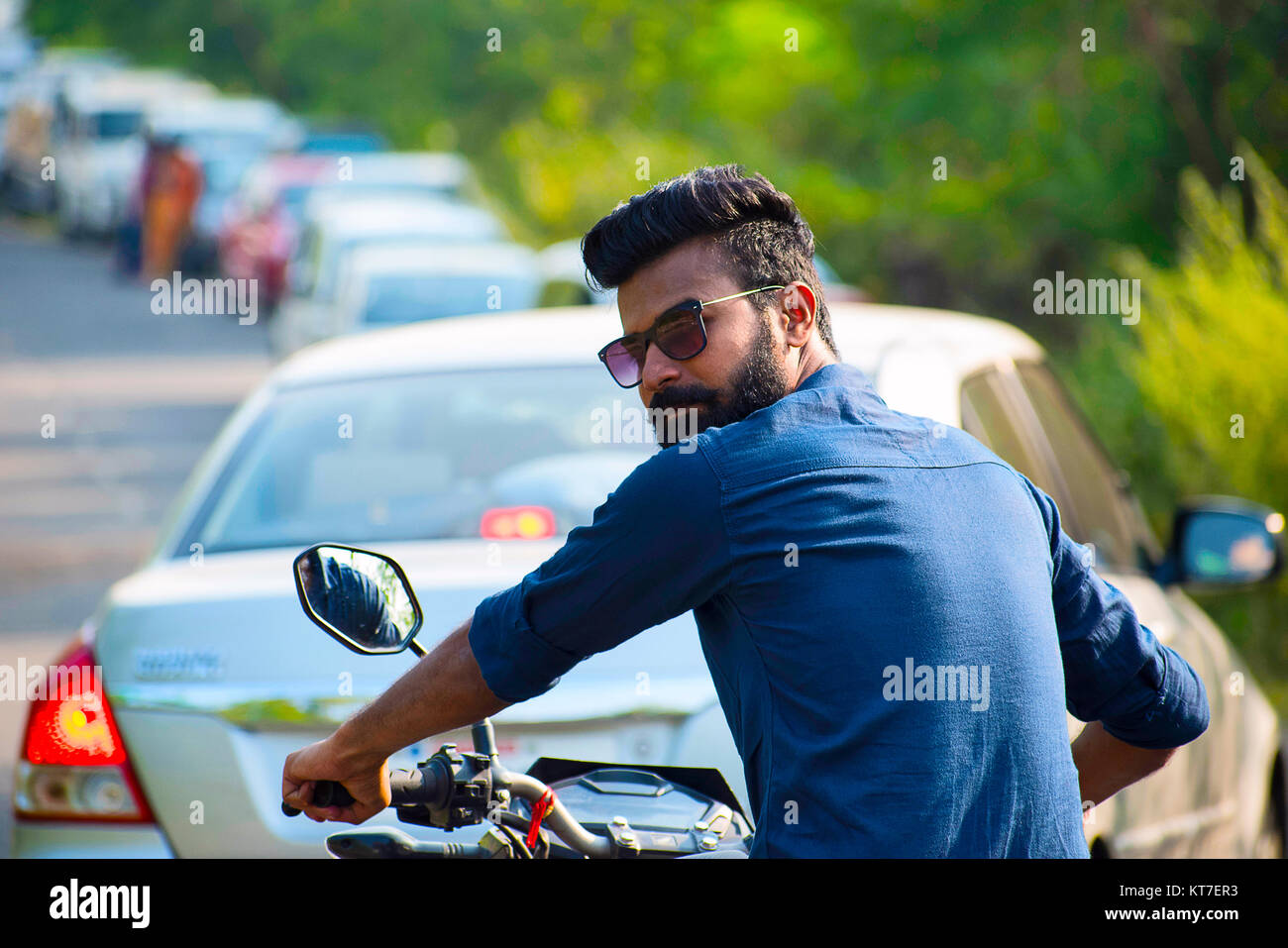 Bike riding face hi-res stock photography and images - Alamy