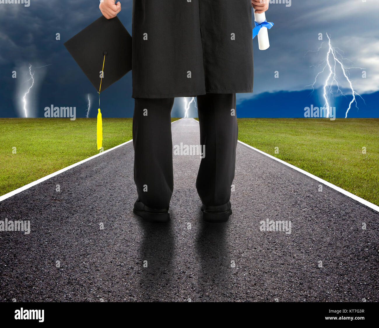 graduate standing on the road and watching the storm Stock Photo - Alamy