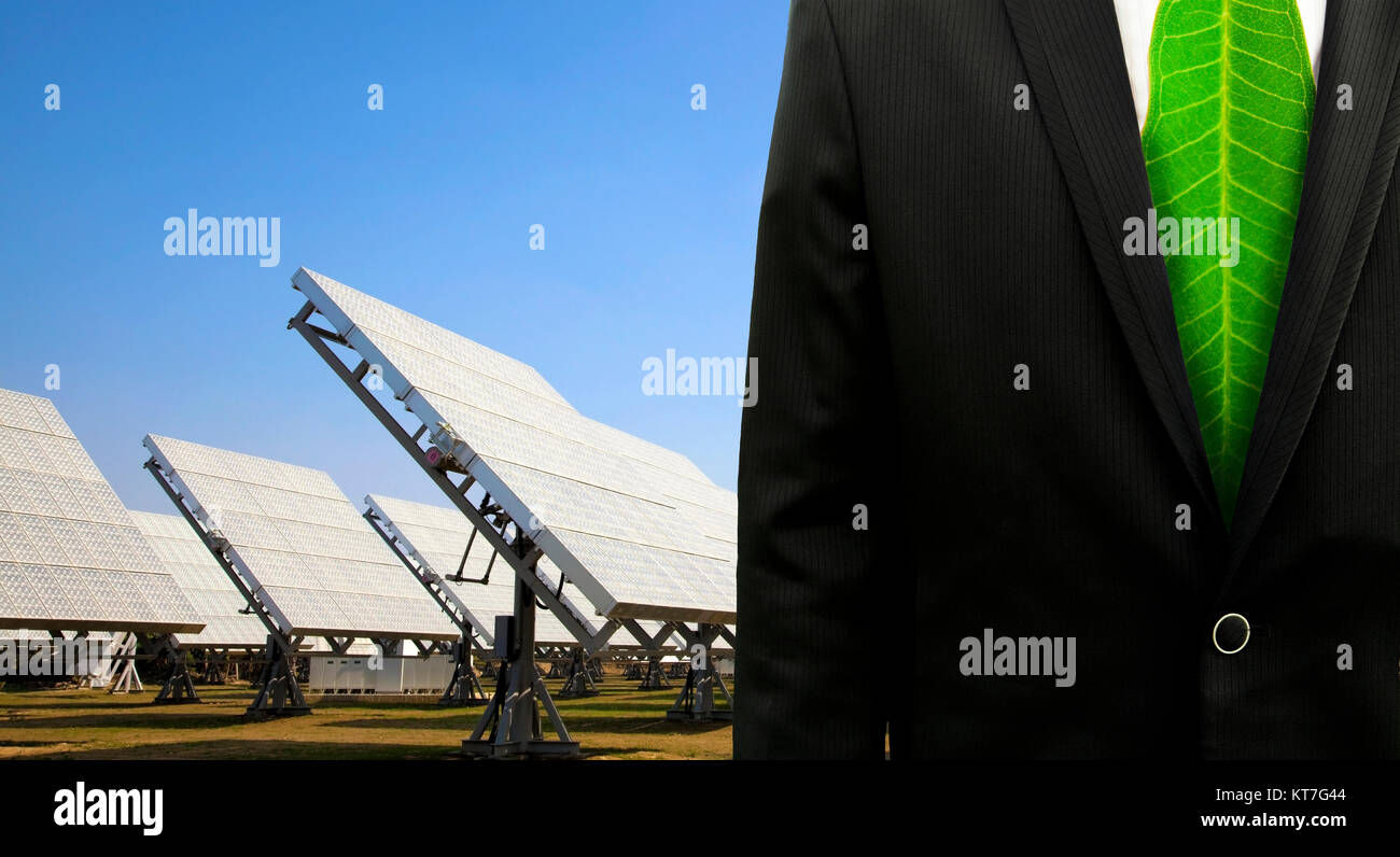Green business concept.business man with solar power plant Stock Photo ...