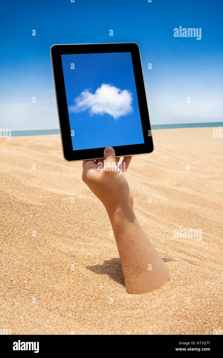 hand holding touch screen computer on the beach Stock Photo - Alamy